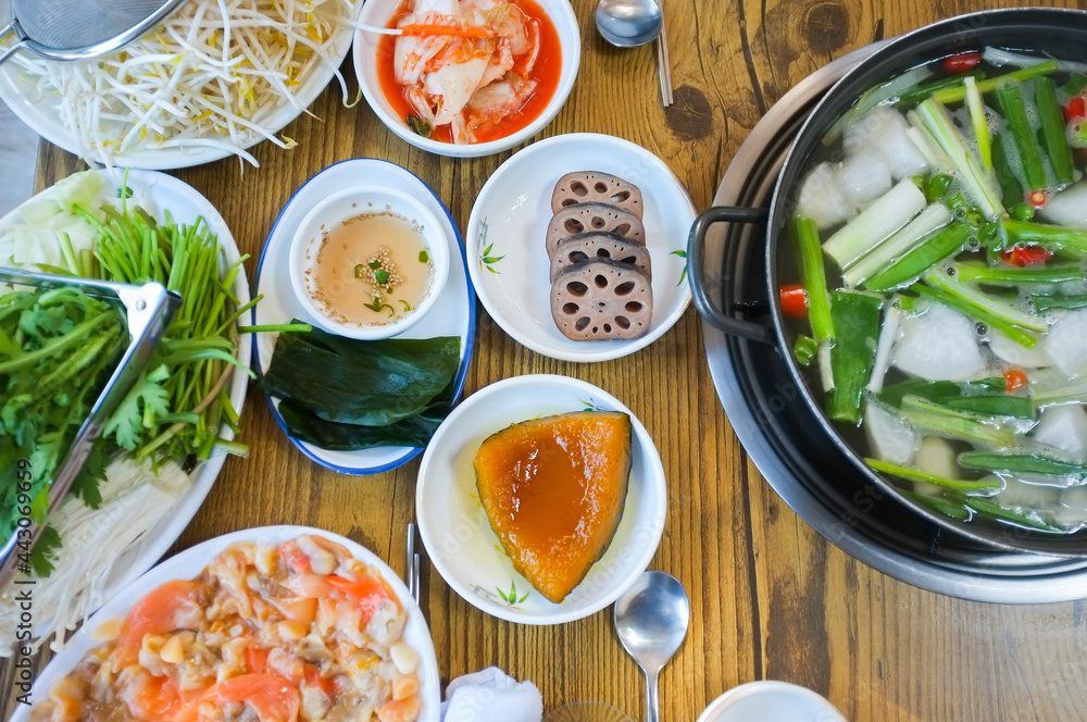 Korean food: Galmi Shabu Shabu with fresh raw Surf clam, kimchi, side ...