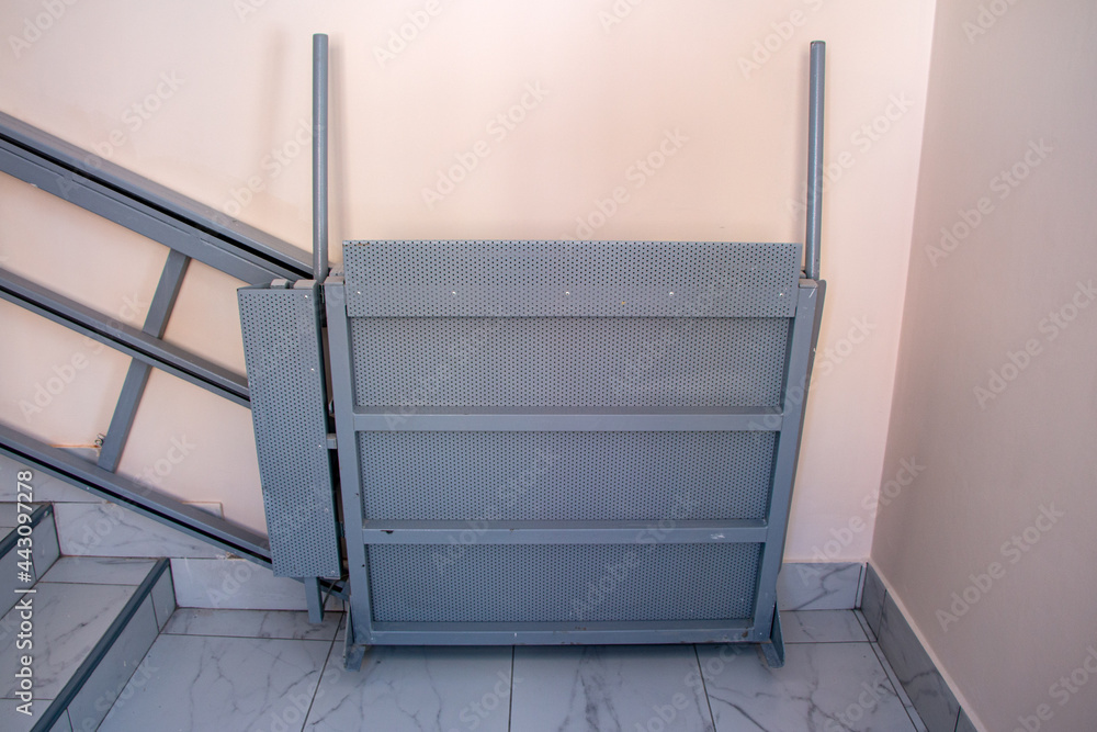 iron gray electric wheelchair lift with ramp and chain mechanism for ...