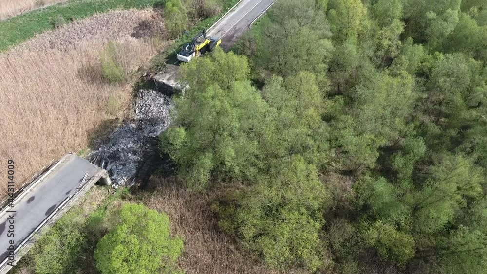 Road collapse, automobile bridge excavator hydraulic crushes concrete ...