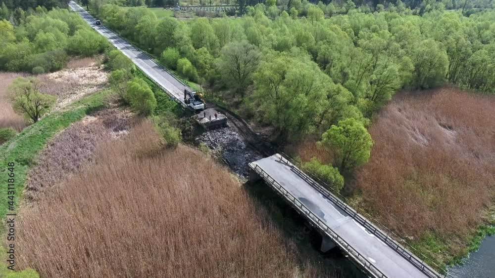 Road collapse, automobile bridge excavator hydraulic crushes concrete ...