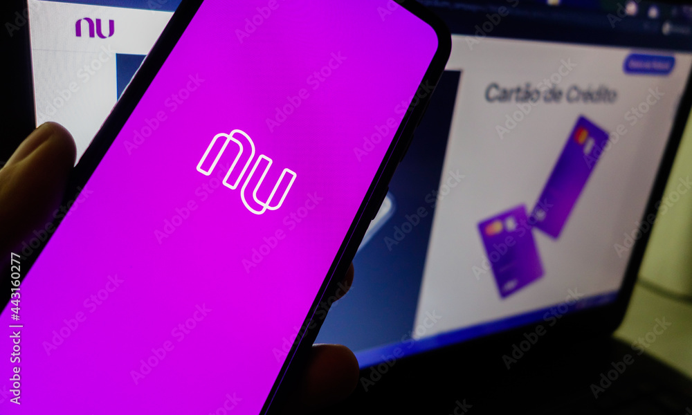 Nubank (brazilian fintech) logo visible on smartphone screen, and ...