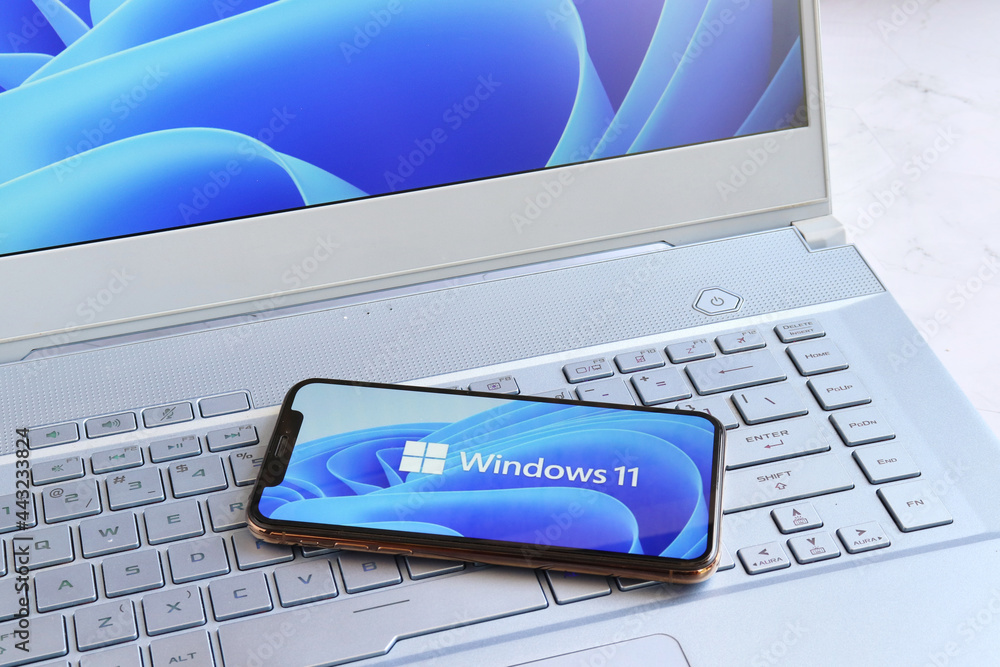 New Microsoft Windows 11 logo on computer screen and Windows 11 logo is ...