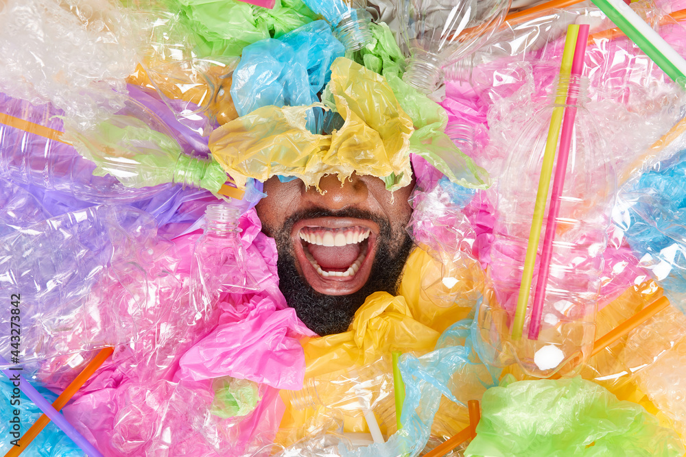 Fotografia do Stock: Non recyclable plastic pollution concept. Bearded ...