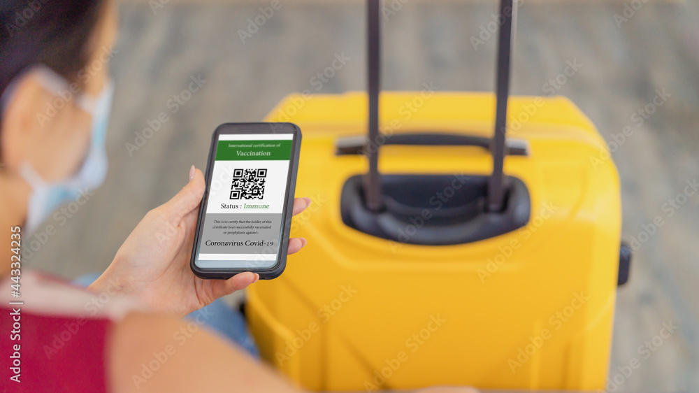 covid-19 vaccination certificate with QR code on smartphone application ...