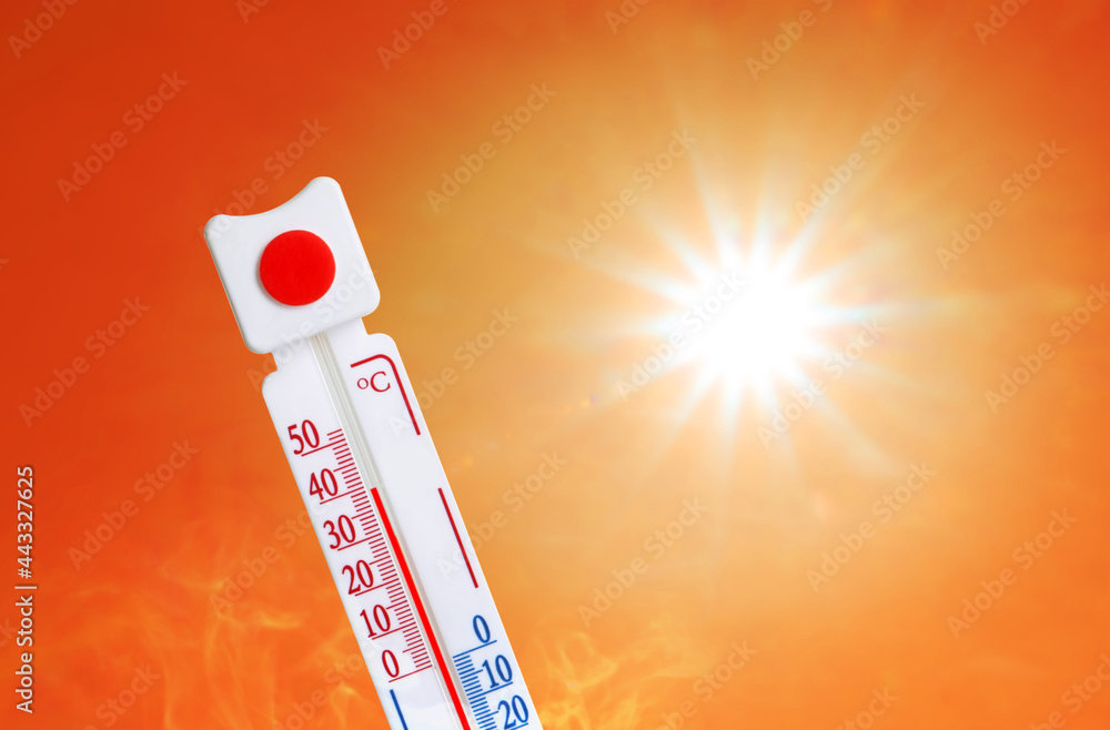 Weather thermometer with high temperature outdoors on hot sunny day ...