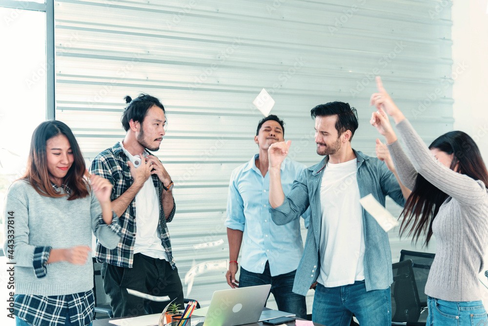 Happy business people holding dollar money and throw in the air ...