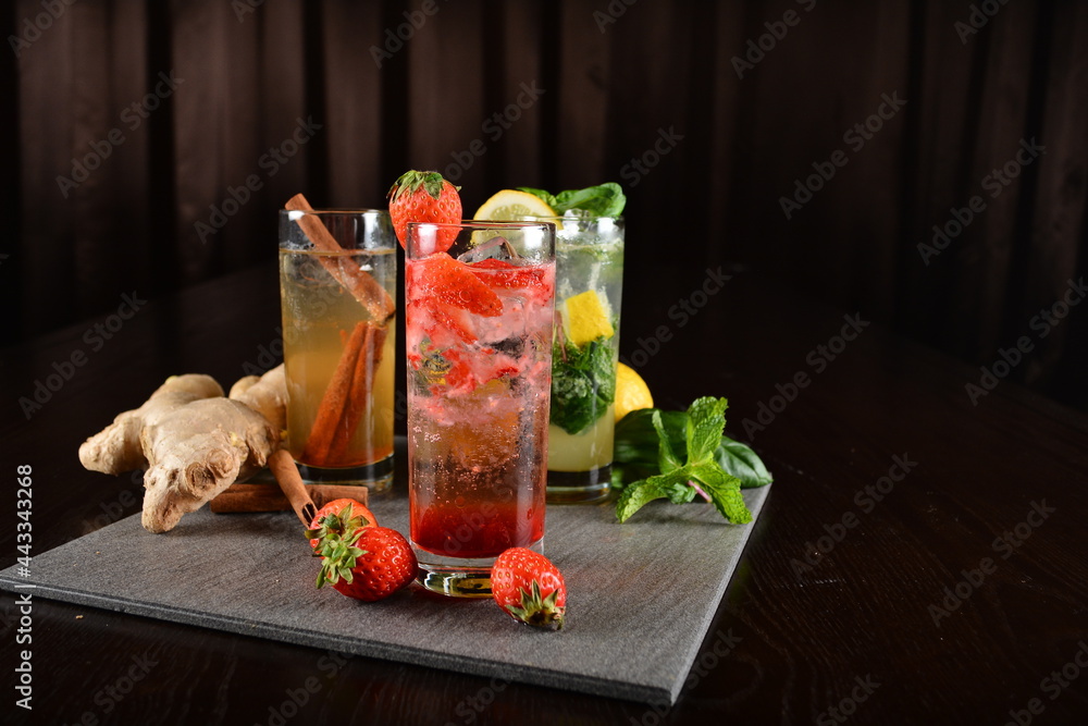 iced cooler juice colourful mocktail drink with ginger, strawberry ...