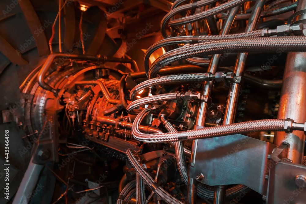 Gas turbine engine, located with internal structural elements, hoses ...
