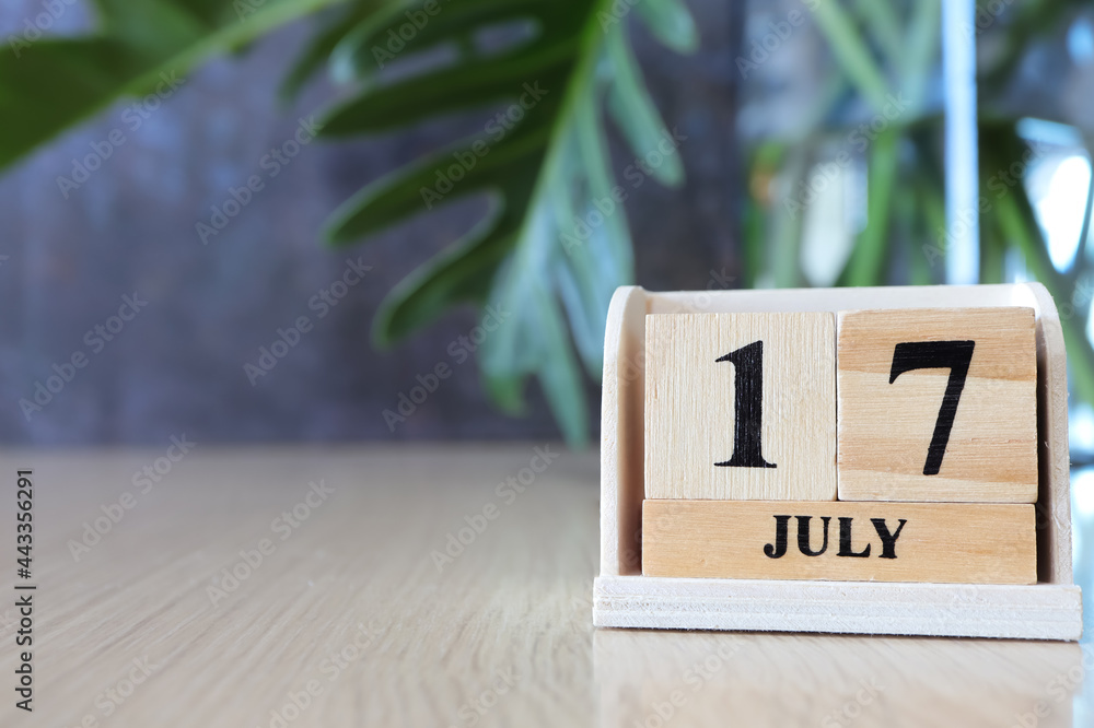 Cube wooden calendar showing date on 17 July. Wooden calendar with date ...