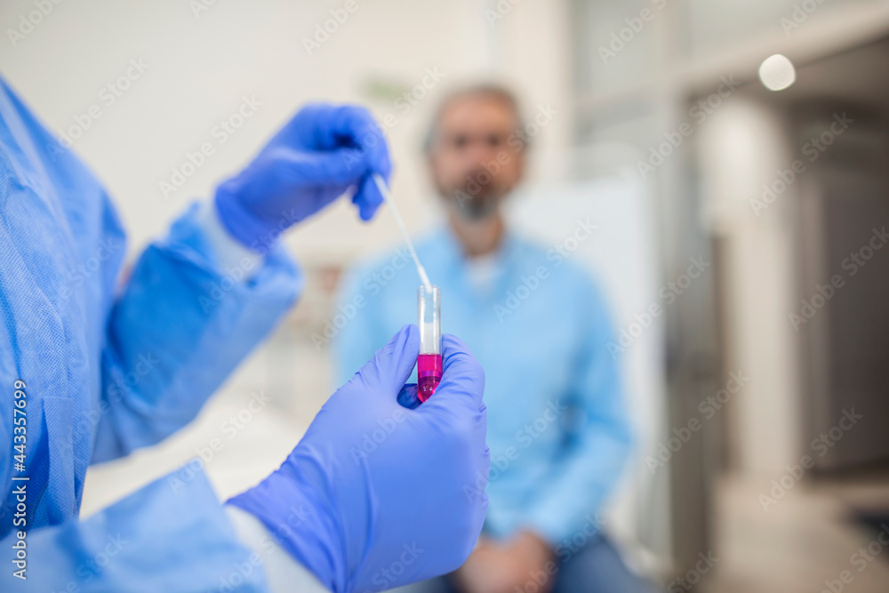 Medical healthcare holding COVID-19 , Coronavirus swab collection kit ...