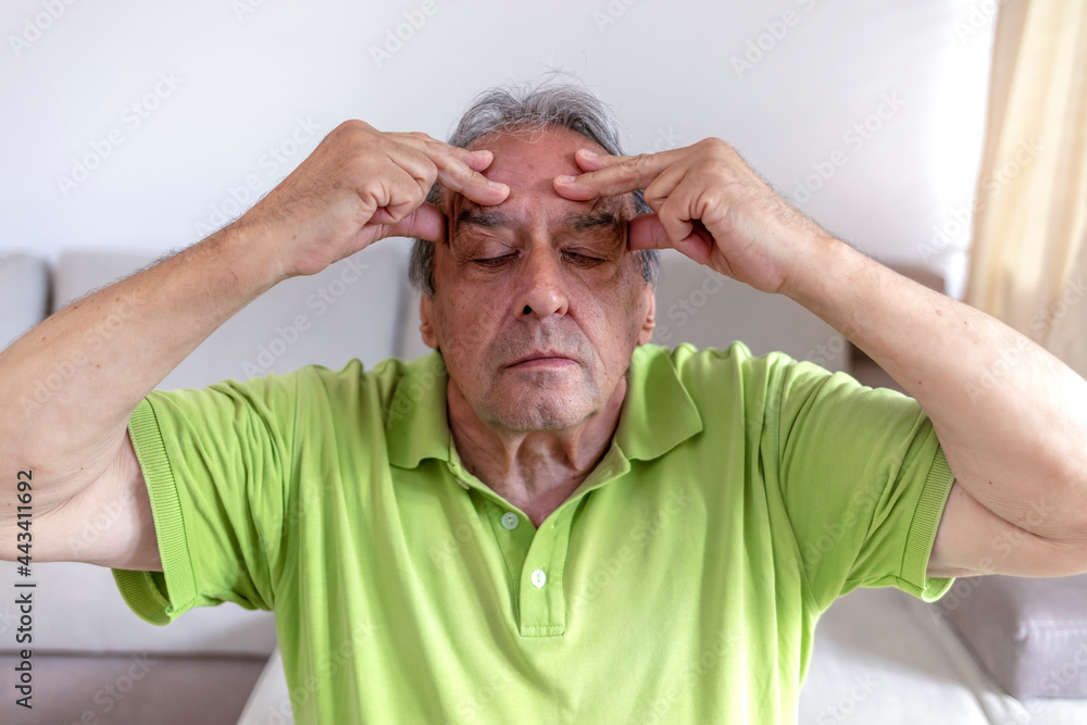 relaxed-modern-70-years-old-man-at-modern-home-in-sunny-summer-day