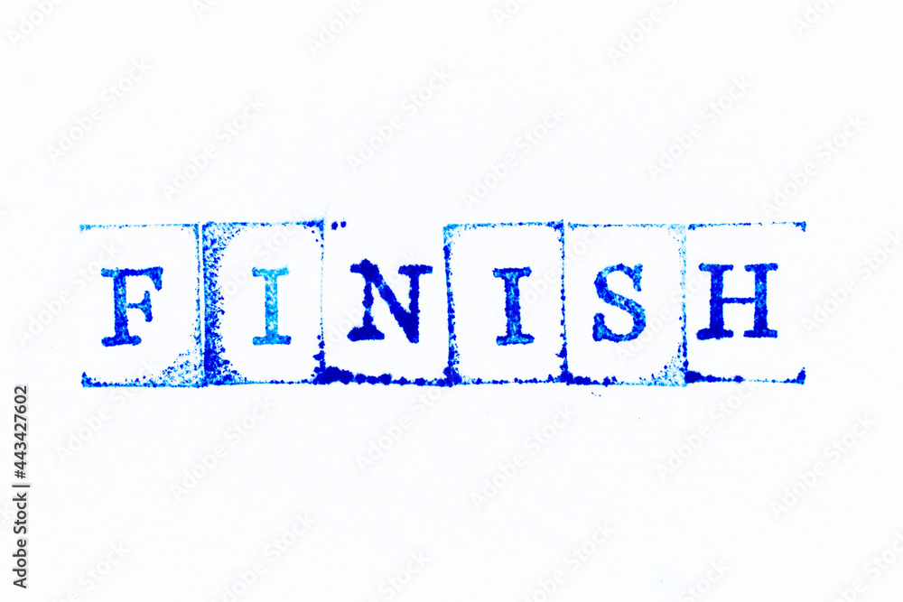 Blue color ink rubber stamp in word finish on white paper background ...