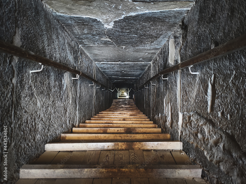 Descent into ancient Egyptian pyramid. Ancient catacombs. Stock Photo ...