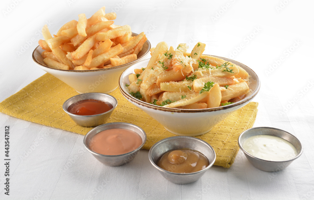 deep fried golden French fries with parmesan cheesy sauce in white ...