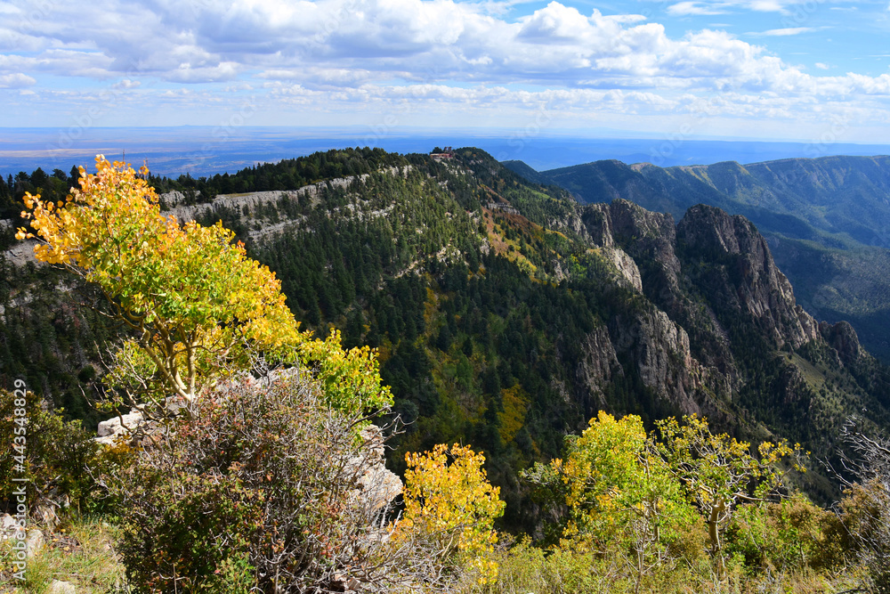 views of granite peaks, evergreens, and changing aspen trees in fall ...