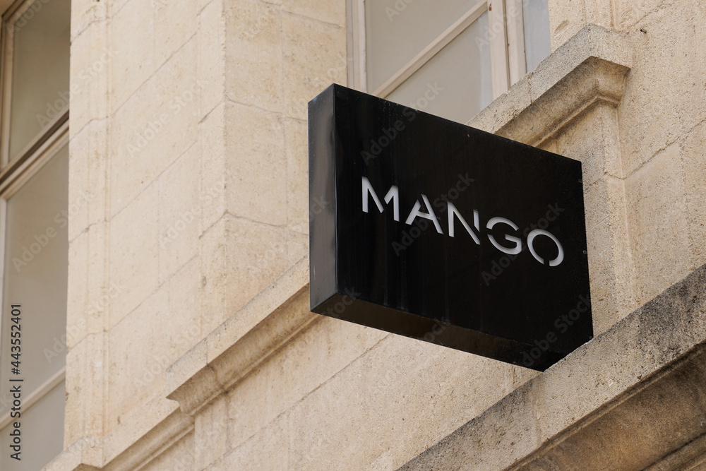 Mango logo text and brand sign of clothing store Spanish clothes trendy ...