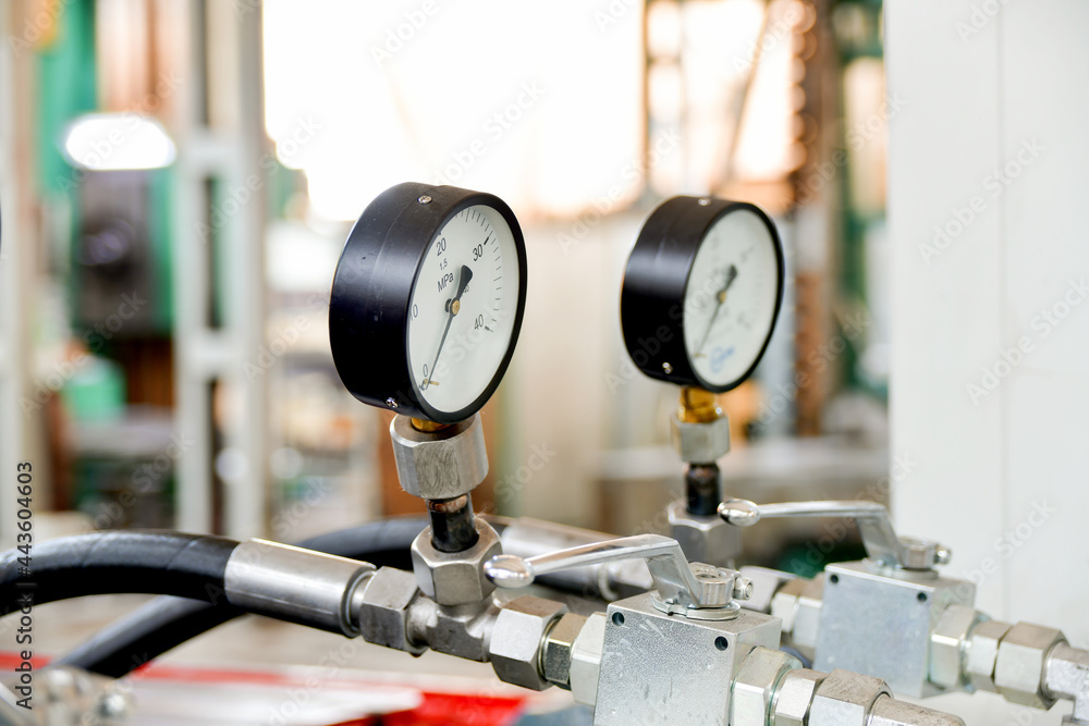 High pressure gauges on the hydraulic oil pump control unit for the ...