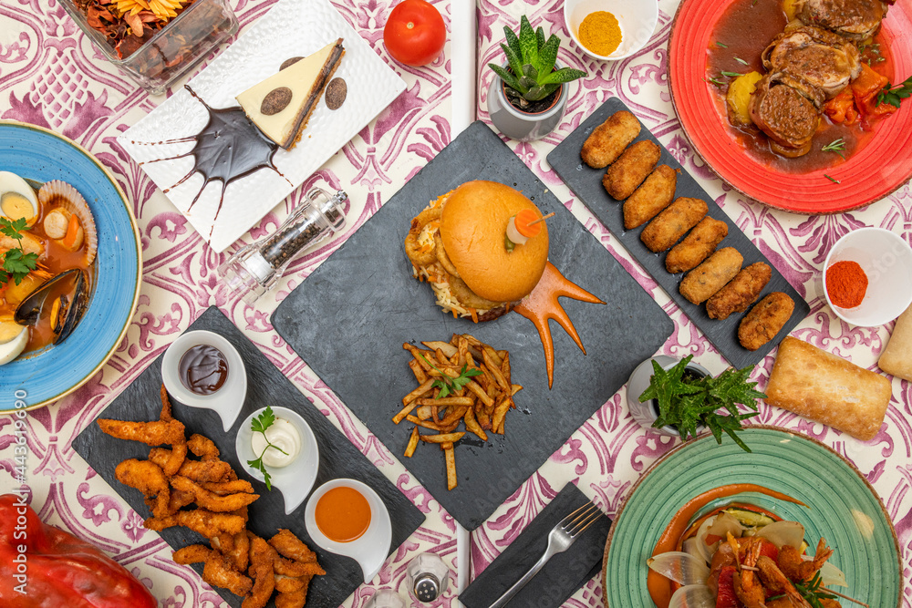 set of beautiful plates of modern and techno-emotional food. chicken ...