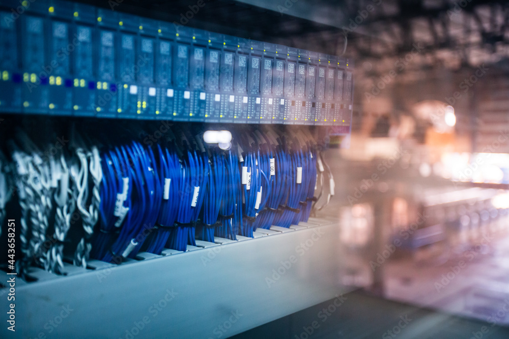 Main Distribution board wiring with factory structure on background ...