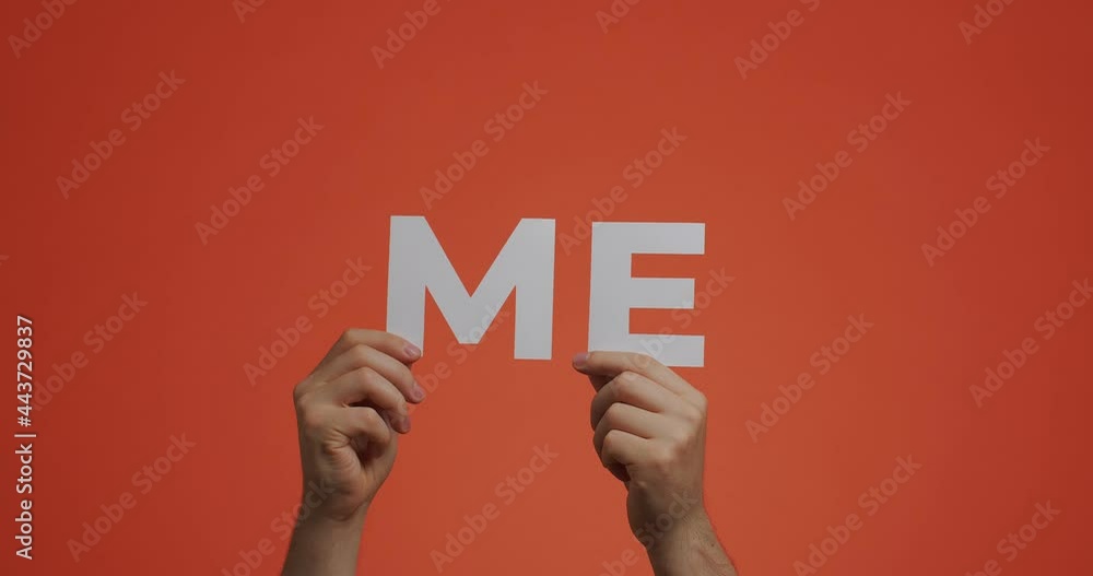 Hands showing word me. 4k video of arms with pronoun made of carved ...
