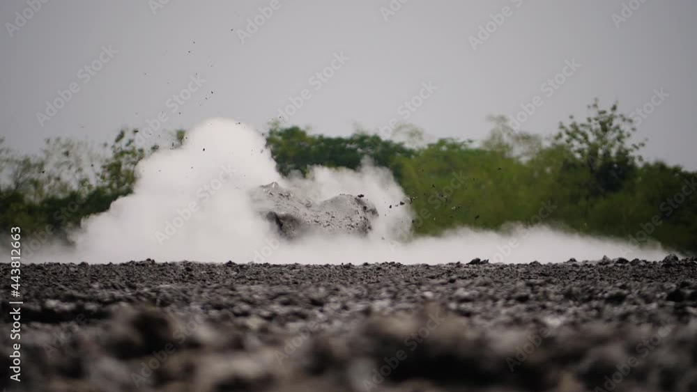 mud volcano with bursting bubble bledug kuwu. volcanic plateau with ...