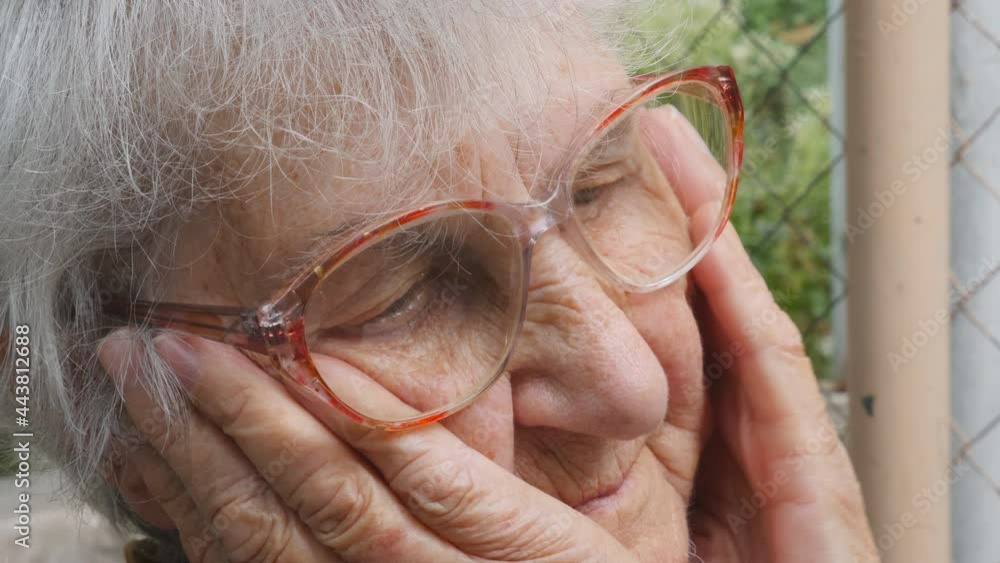 Portrait of grandmother with emotions and feelings. Old woman looking ...