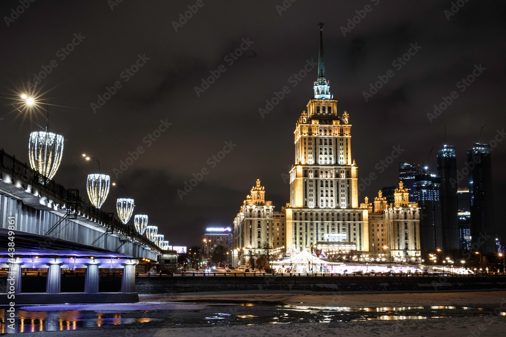Night building of the Stalinist skyscraper of the Ukraina hotel on the ...