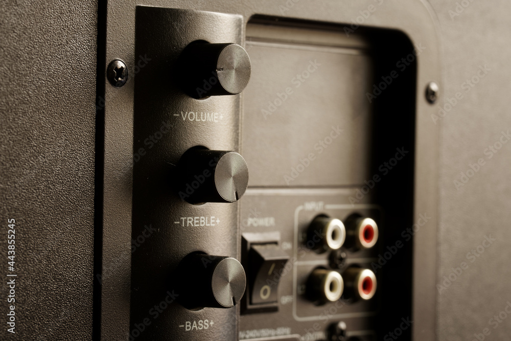Volume, treble and bass controls on the back of the powerful subwoofer ...