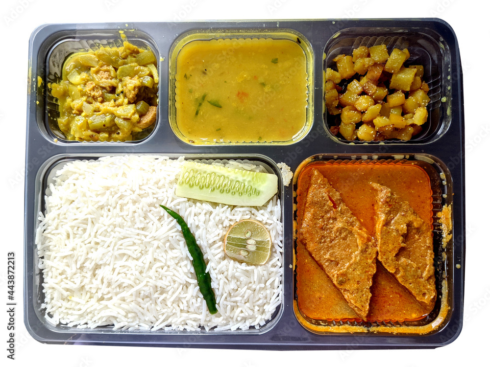 Indian veg thali for lunch in white background. rice, dal, fry, sabji ...
