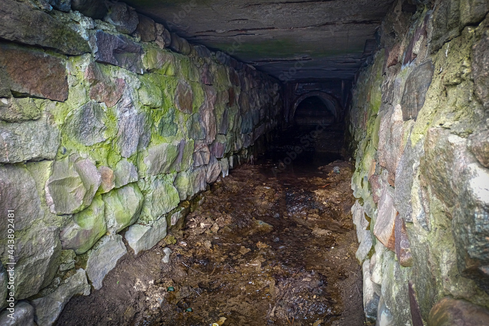 Old underground canal, water drainage system. Ancient underground ...