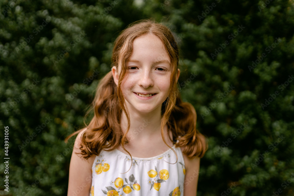 portrait of beautiful tween with red hair Stock Photo | Adobe Stock
