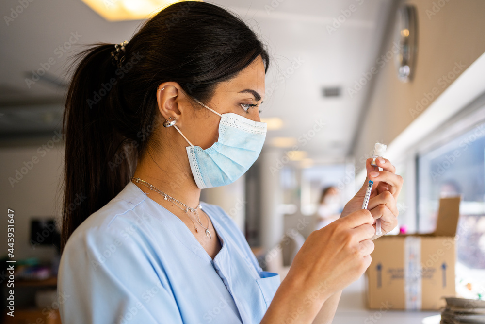 COVID-19 Vaccination In The Hospital. Stock Photo | Adobe Stock