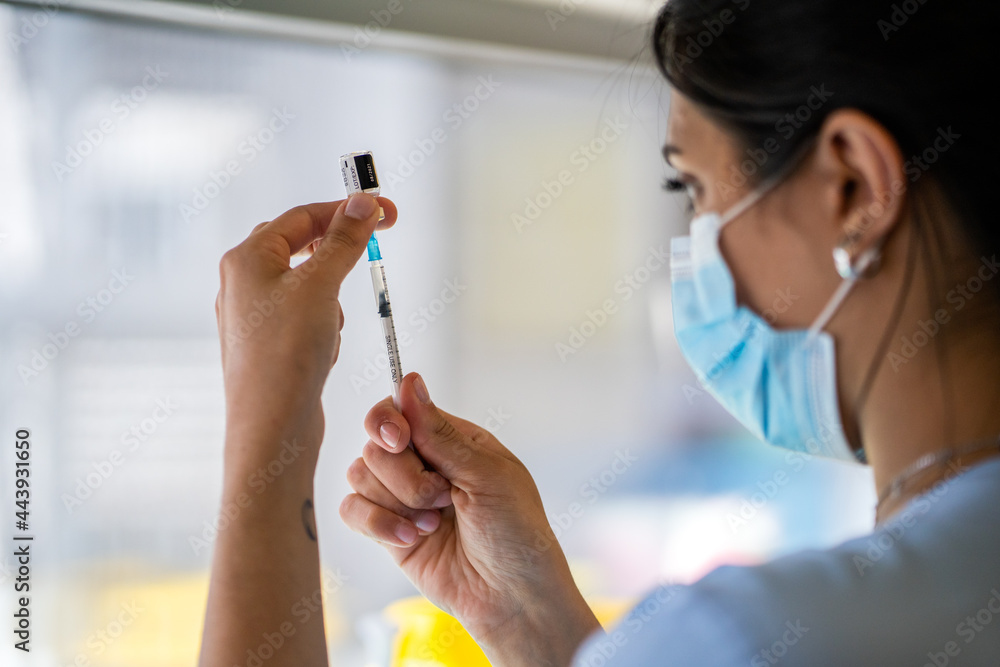 COVID-19 Vaccination In The Hospital. Stock Photo | Adobe Stock