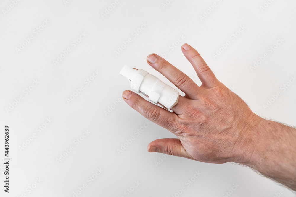 orthosis for fixing the finger on hand on a white background Stock ...