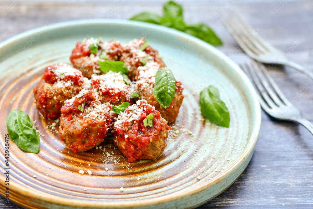 Tasty home made italian dish mini meatballs baked in marinara tomato ...
