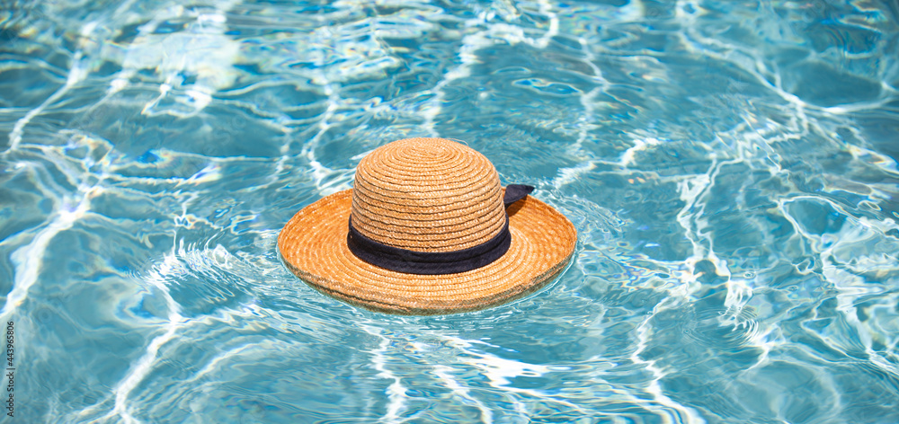 Straw hat in swimming pool, summer vacation concept. Stock Photo ...