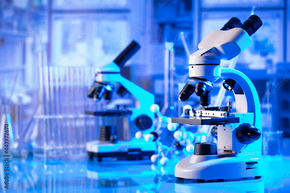 Laboratory investigations concerning covid pandemy. Microscope, glass ...