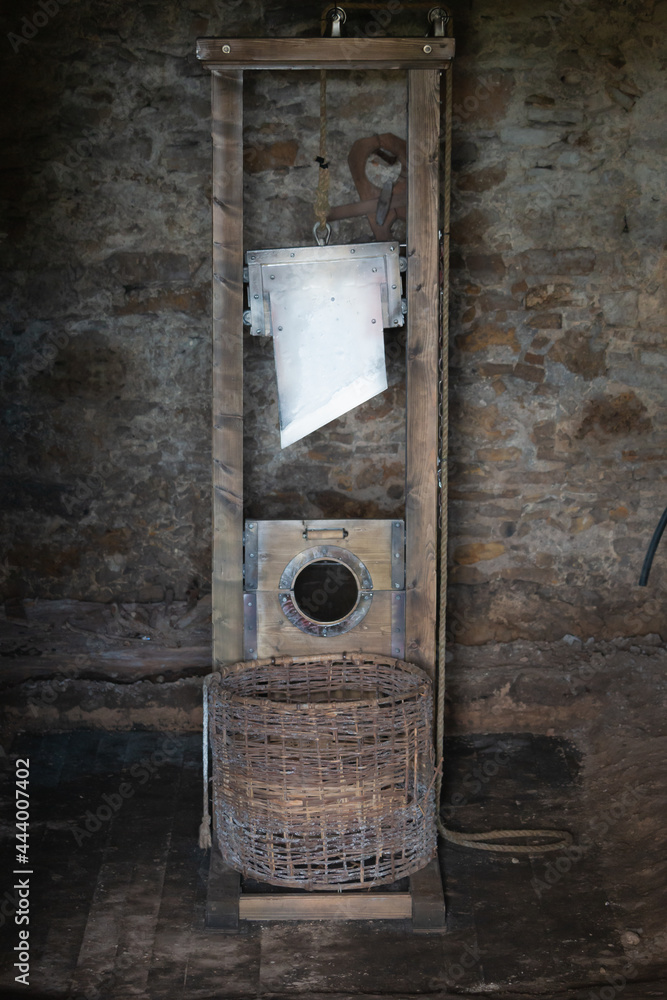 Real size working historic Guillotine made from wood and blade Stock ...