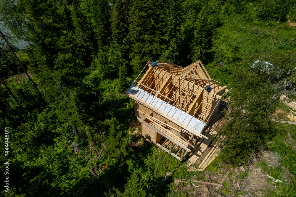 Aerial top view stages of construction houses wood build roof. New home ...