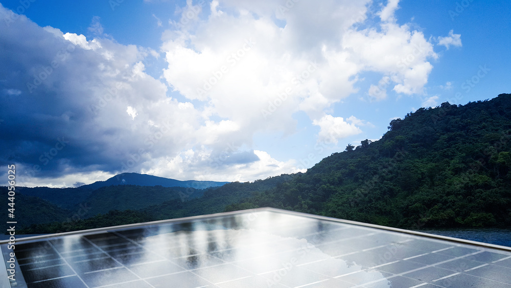 Small solar cell panels with the sunlight, installed at a remote house ...