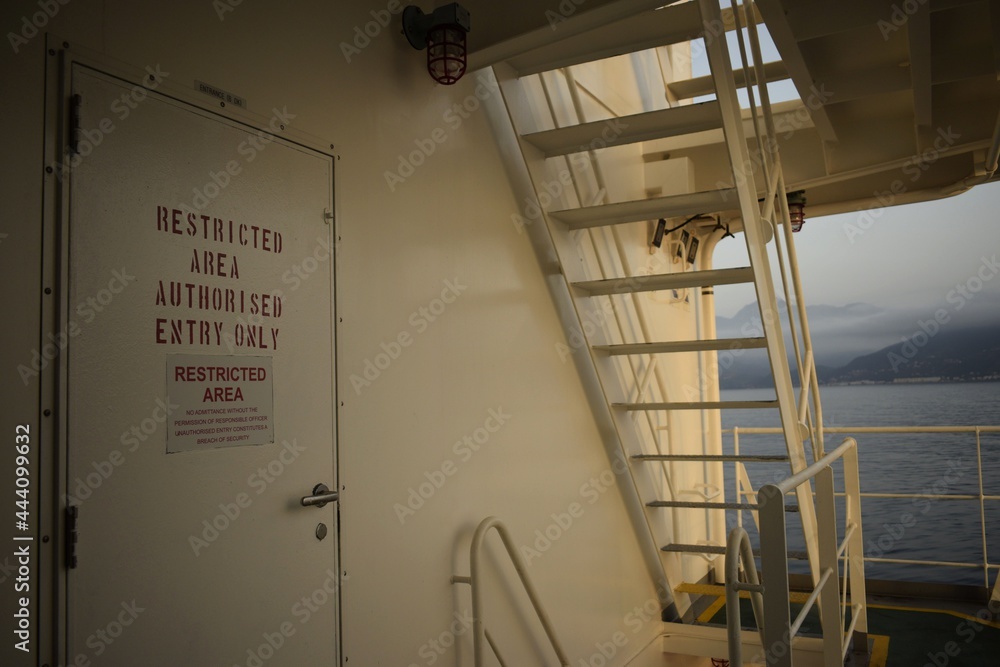 staircase and entry door of a ship's structure Stock Photo | Adobe Stock