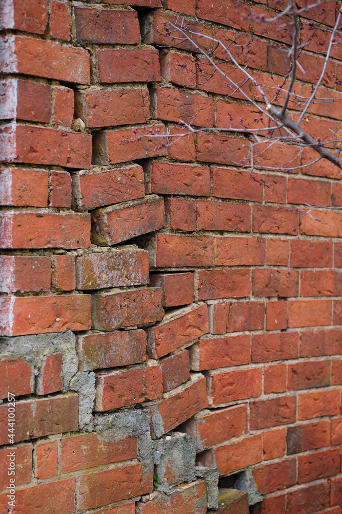 Broken and crooked brick wall Stock Photo | Adobe Stock