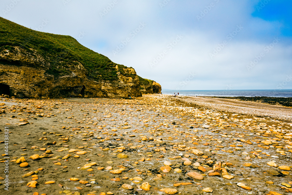 Cliffs and beach at Blackhall Rocks and Cromdon Dene Beach Stock Photo ...