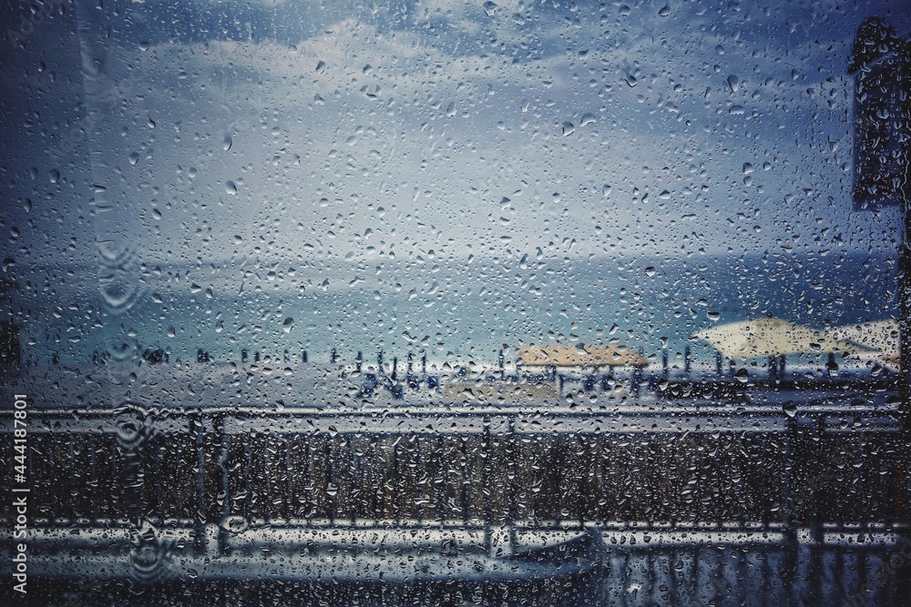 Full Frame Shot Of Wet Glass Window In Rainy Season Stock Photo | Adobe ...