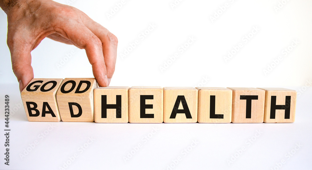Good or bad health symbol. Doctor turns wooden cubes and changes words ...