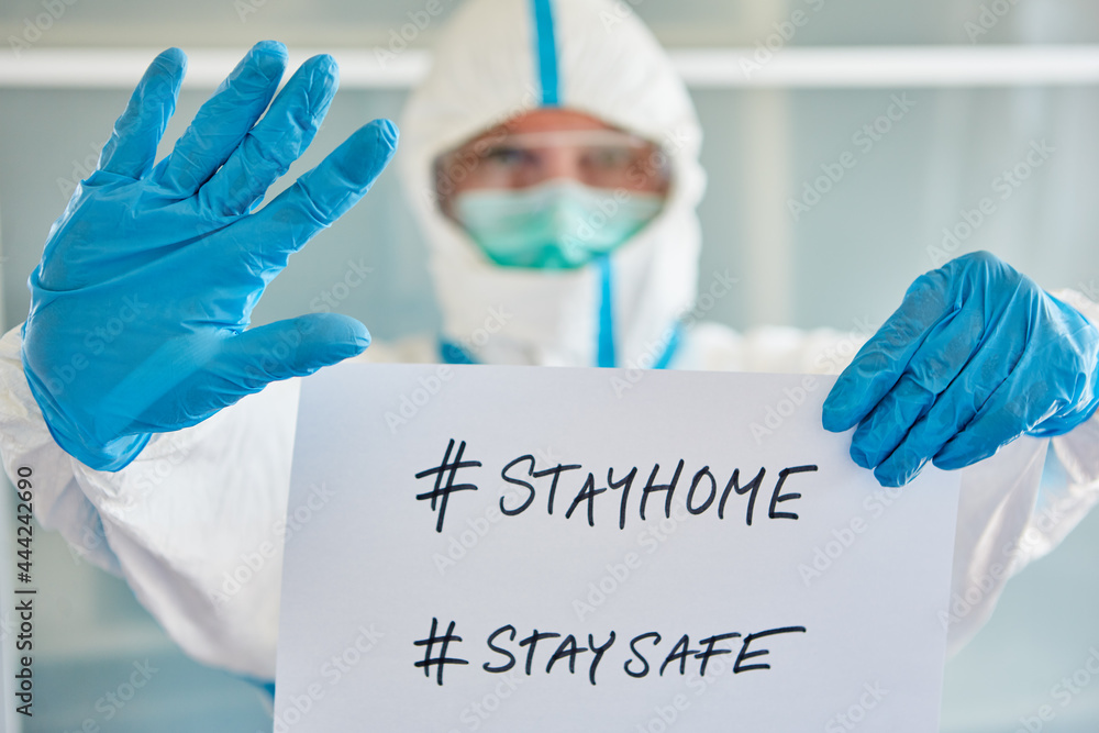 Disease control staff with #stayhome #staysafe posted for Covid 19 ...