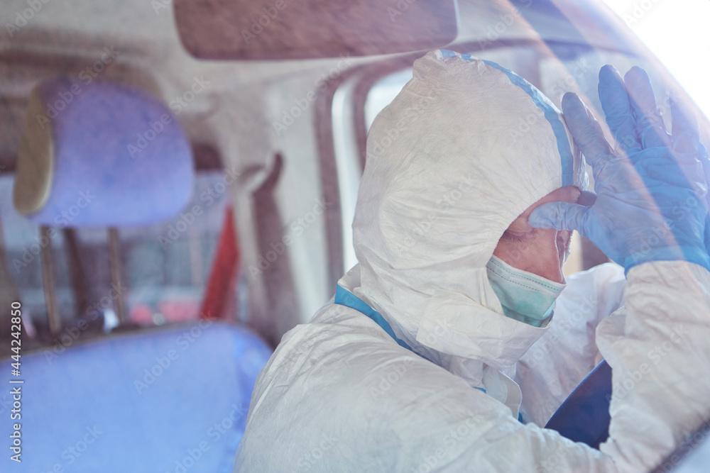 Tired paramedic in ambulance takes break from coronavirus pandemic ...