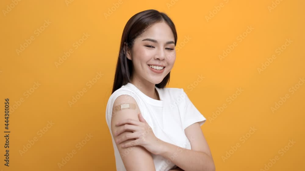Vaccination. Young beautiful asian woman getting a vaccine protection ...