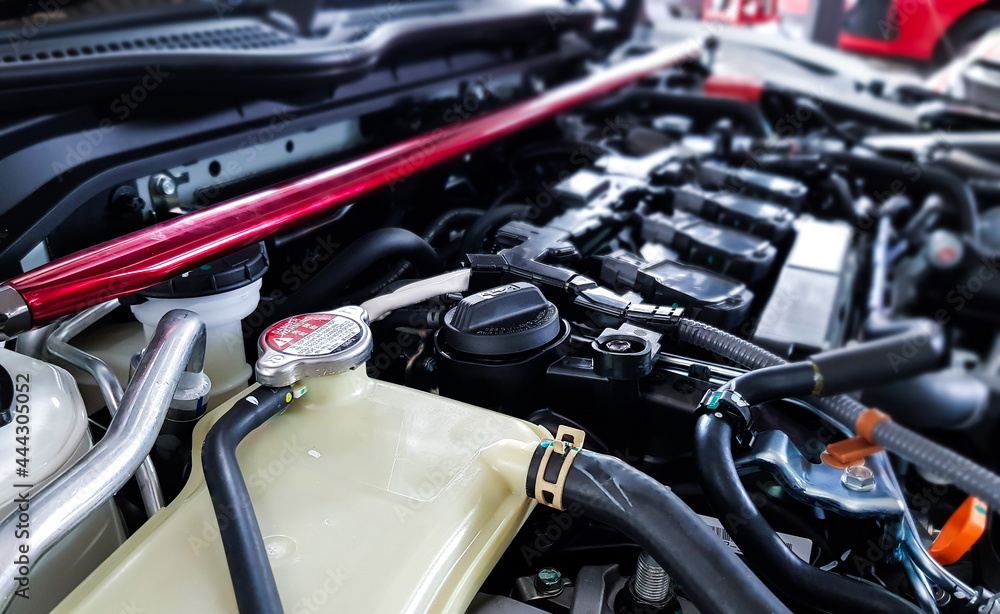 Radiator cap and Engine oil cap close up concept image in engine room ...