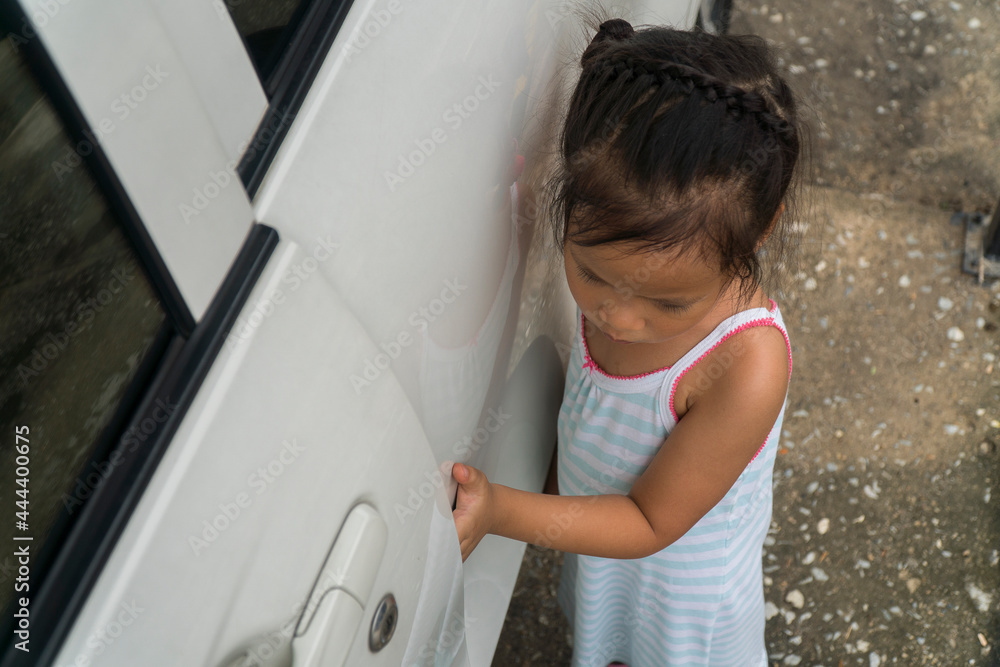 kid hand or finger pinched by the car door; close up portrait of finger ...